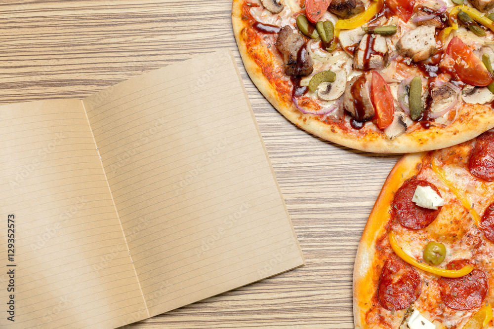 Pizza with blank paper with copy space Stock Photo | Adobe Stock