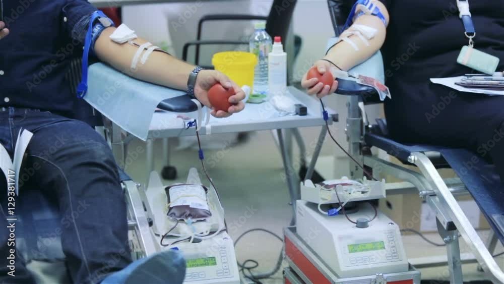 Men donate blood voluntarily in the station of blood transfusion Stock ...