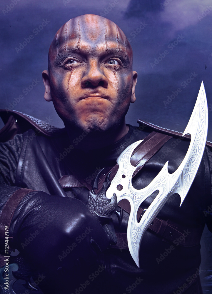 Portrait of man with double-bladed glaive Stock Photo | Adobe Stock