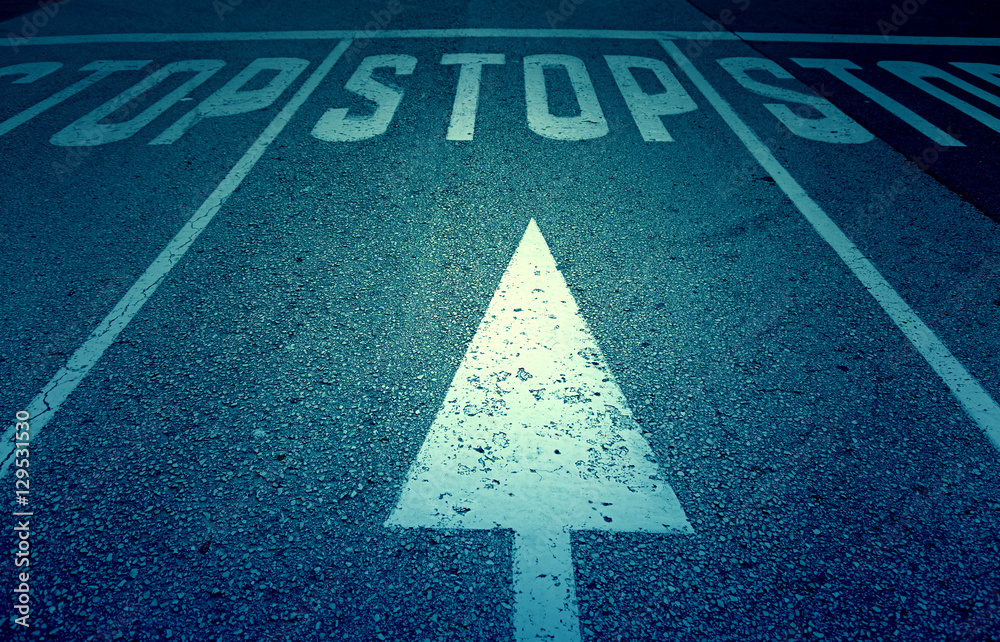 Stop sign on asphalt Stock Photo | Adobe Stock