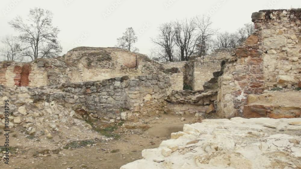 camera slide over walls of ruins of medieval castle in city of ilza in ...