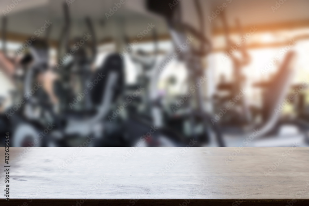 wood table with background of fitness room for display your prod Stock ...
