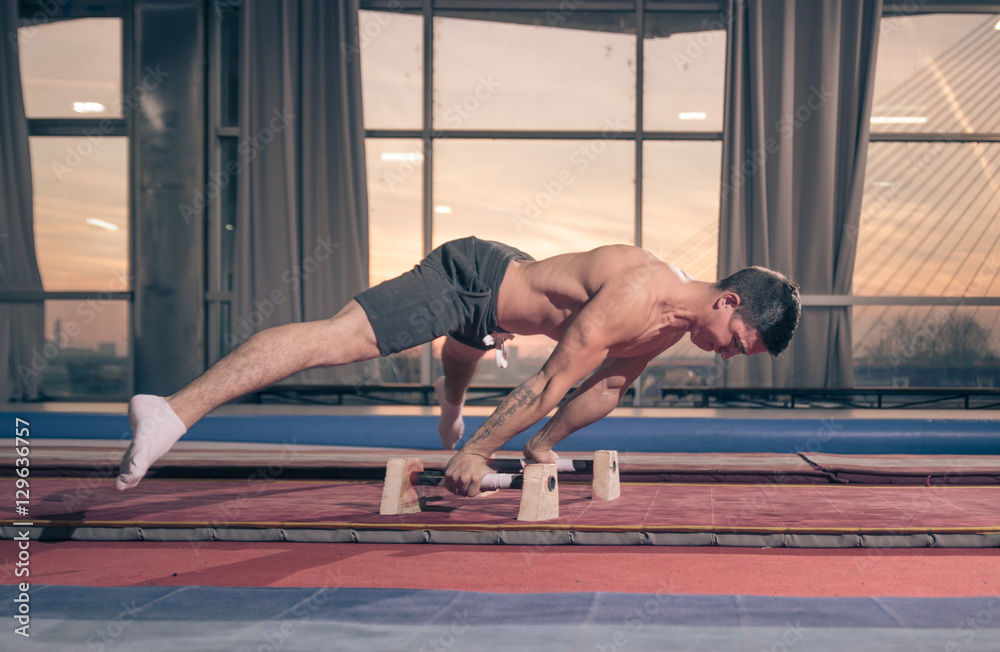 young man two hand cartwheel Stock Photo | Adobe Stock