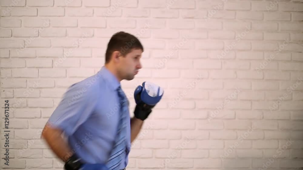 Businessman with boxing gloves. Boxing man in a shirt and tie. Manager ...