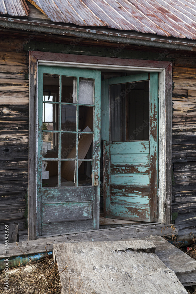 broken doors on a broken house Stock Photo | Adobe Stock