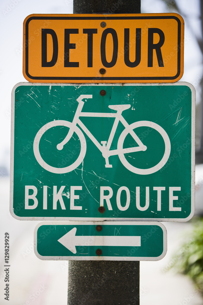 Bike route sign with arrow showing the direction Stock Photo | Adobe Stock