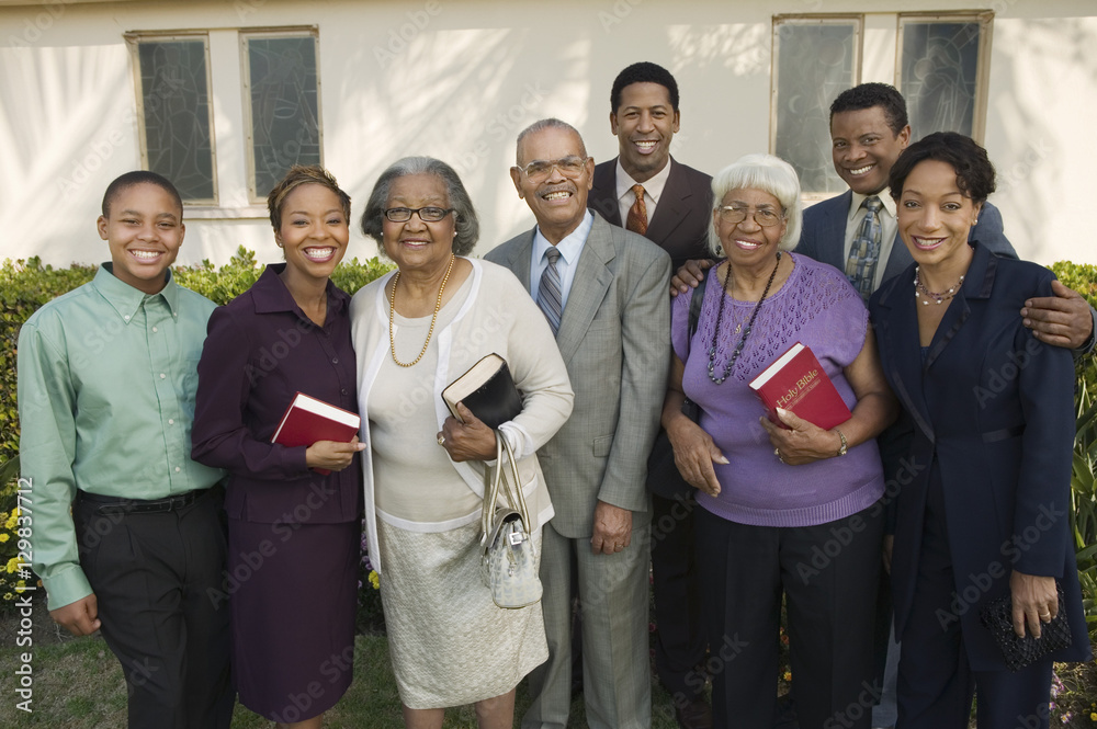 Christian Family on patio holding Bibles portrait Stock Photo | Adobe Stock