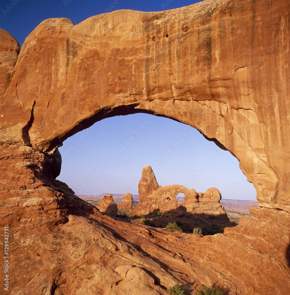 Rock formations caused by erosion, with Turret Arch seen through North ...