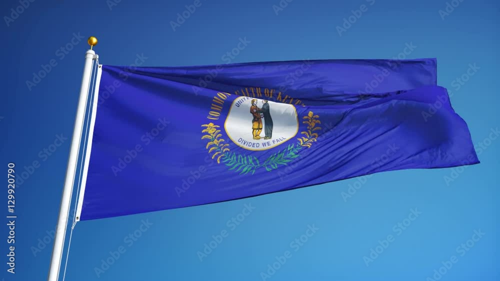 Kentucky (U.S. state) flag waving in slow motion against blue sky ...