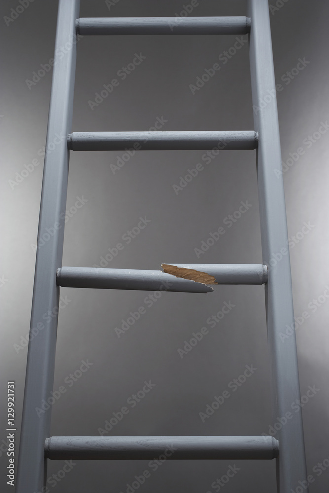 Ladder with one step broken foto de Stock | Adobe Stock