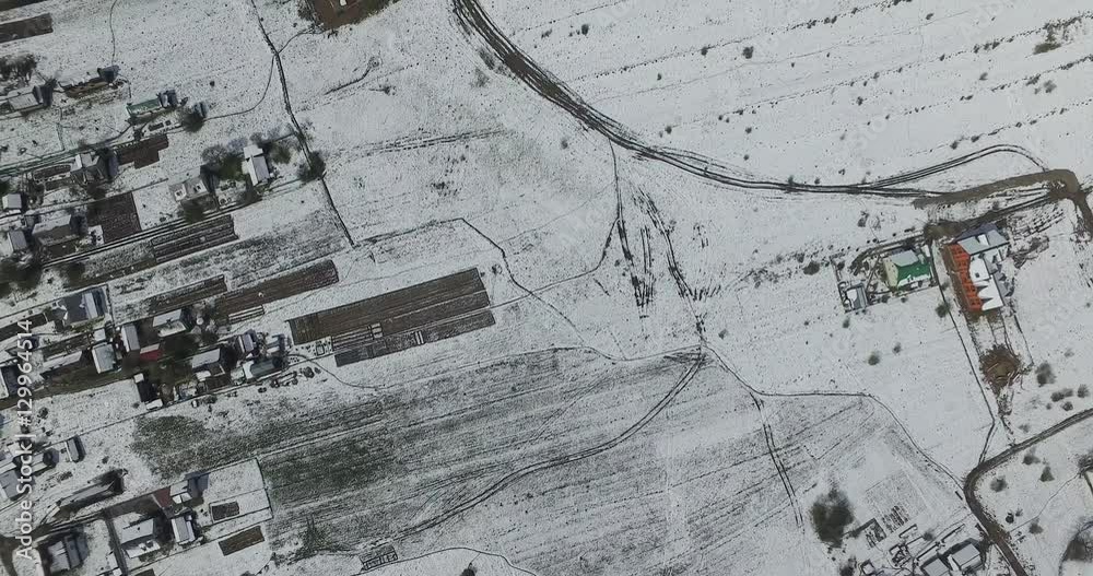 Snowbound small town. Top view. Aerial view Stock Video | Adobe Stock