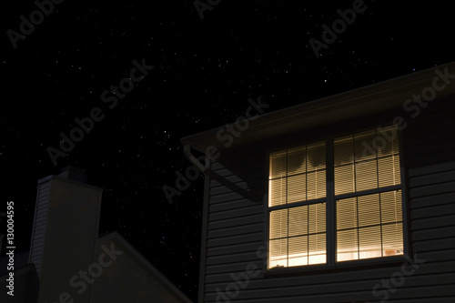 Lit window of building exterior at night Stock Photo | Adobe Stock