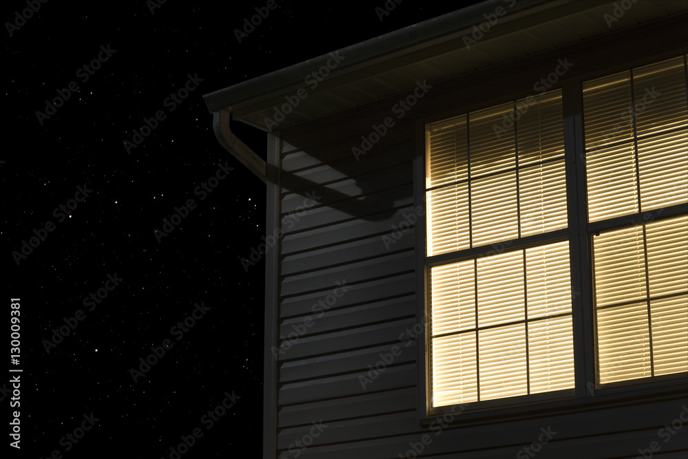 Lit window of building exterior at night Stock Photo | Adobe Stock