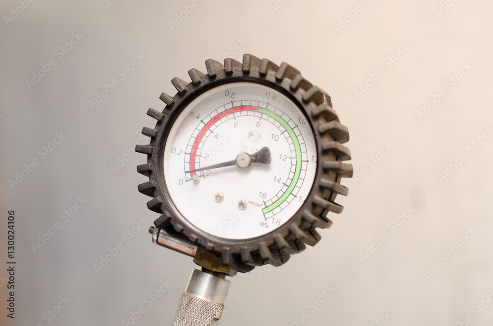 Industrial manometer pressure gauge isolated on a white background. Air ...