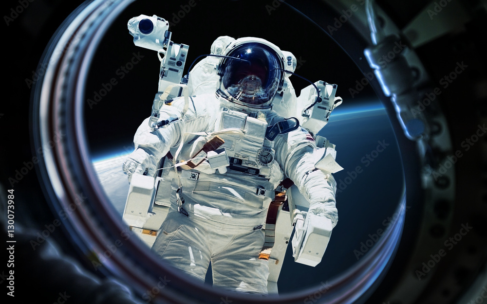 Space Shuttle Astronaut Looking Into Window