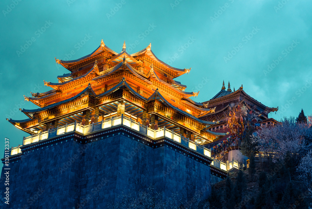 Light from the temple at night in vintage and dramatic tone at Shangri ...