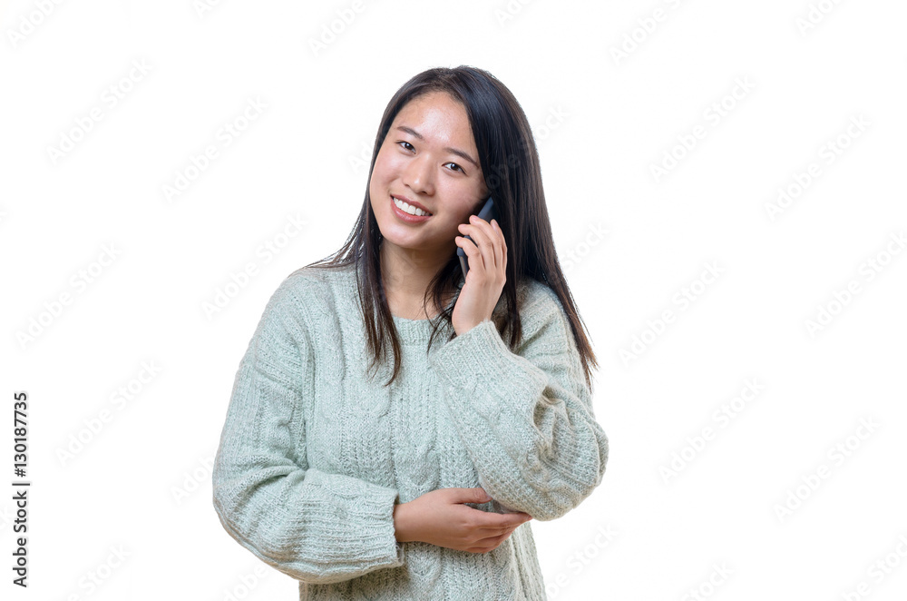 Laughing chinese woman talking on a mobile Stock-Foto | Adobe Stock