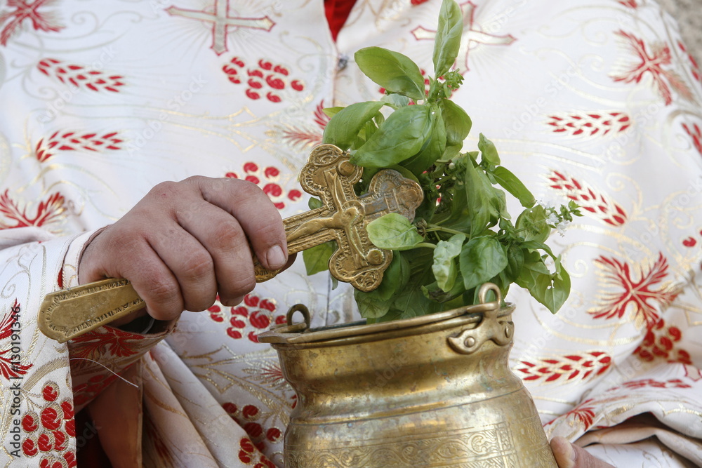Melkite priest celebrating the feast of the cross, Nazareth, Galilee ...