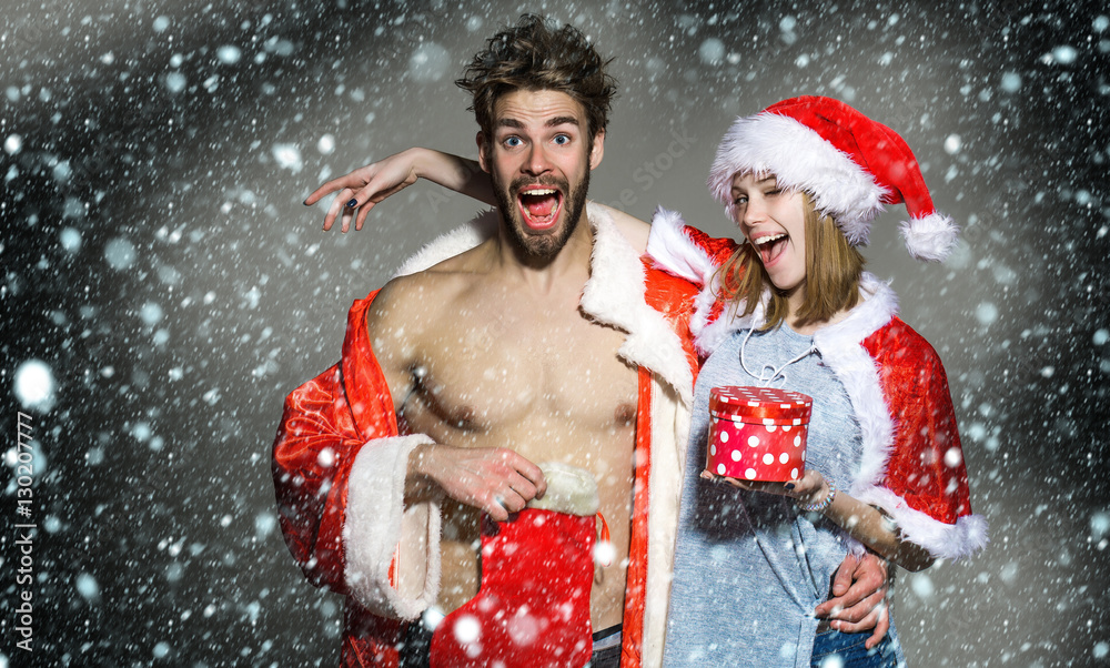 happy christmas couple of santa Stock-Foto | Adobe Stock