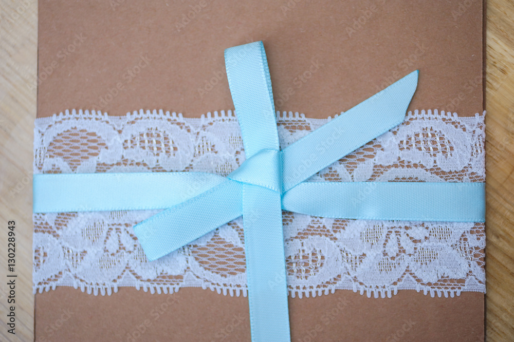 beautiful gift packaging with Blue Ribbon Stock Photo | Adobe Stock