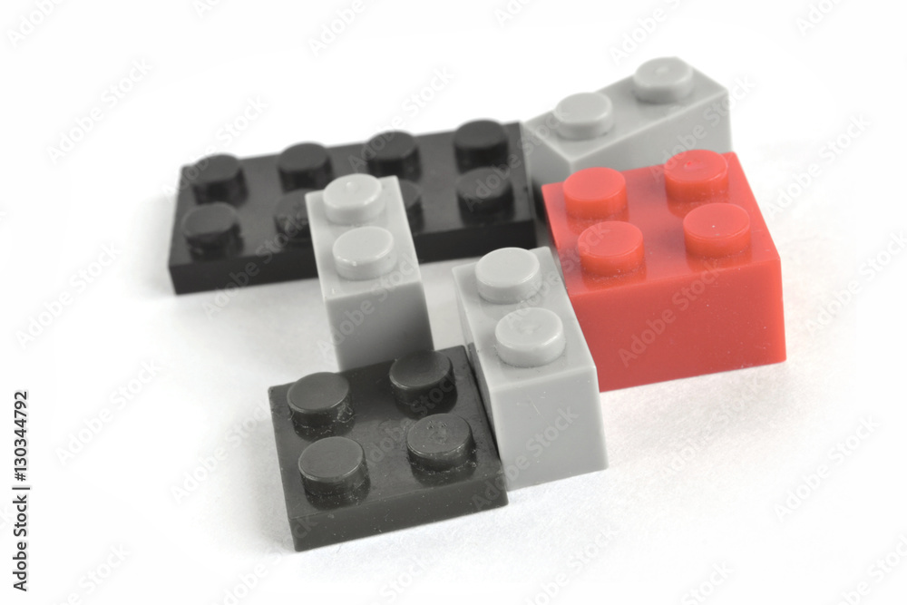Interlocking plastic blocks on white background Stock Photo | Adobe Stock