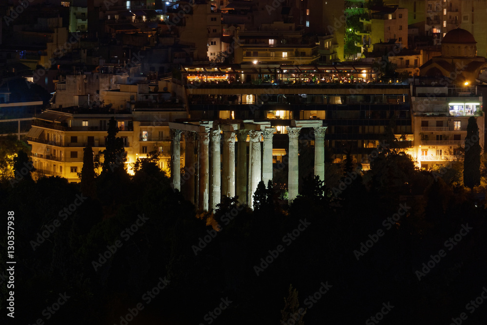 Athens Greece, night view of Olympian Zeus temple ruins and city lights ...