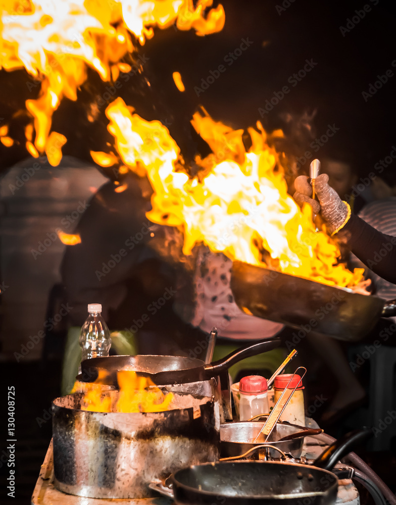 Chef Cooking With Fire
