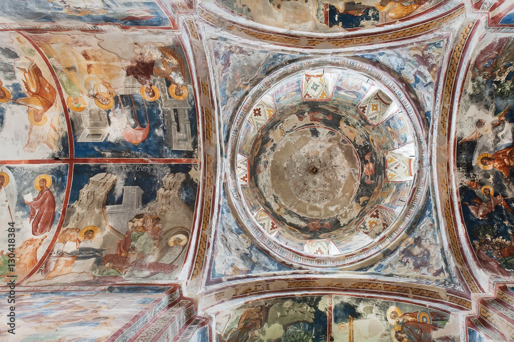 Surface with old frescoes under the dome of medieval cathedral Gelati ...