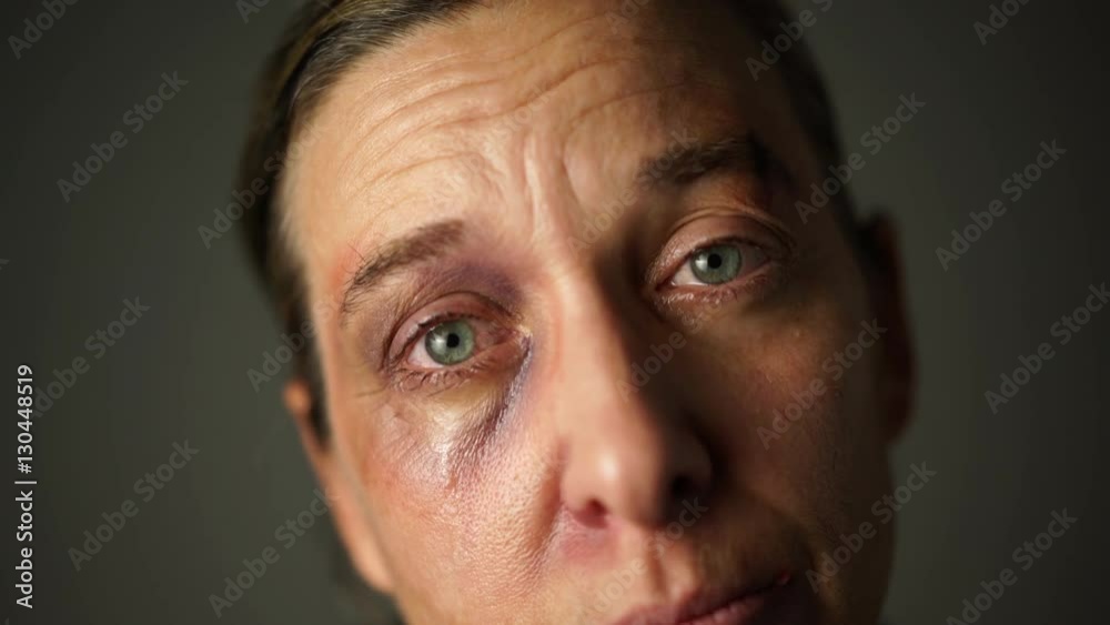 4k footage, closeup face of sad tortured woman with black eyes and ...