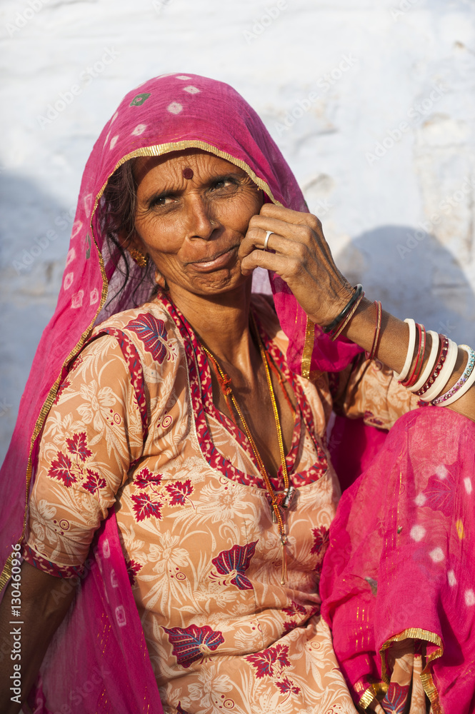A Rajasthani woman wearing a traditional veil called a Ghoonghat, Rajasthan Stock Photo | Adobe ...