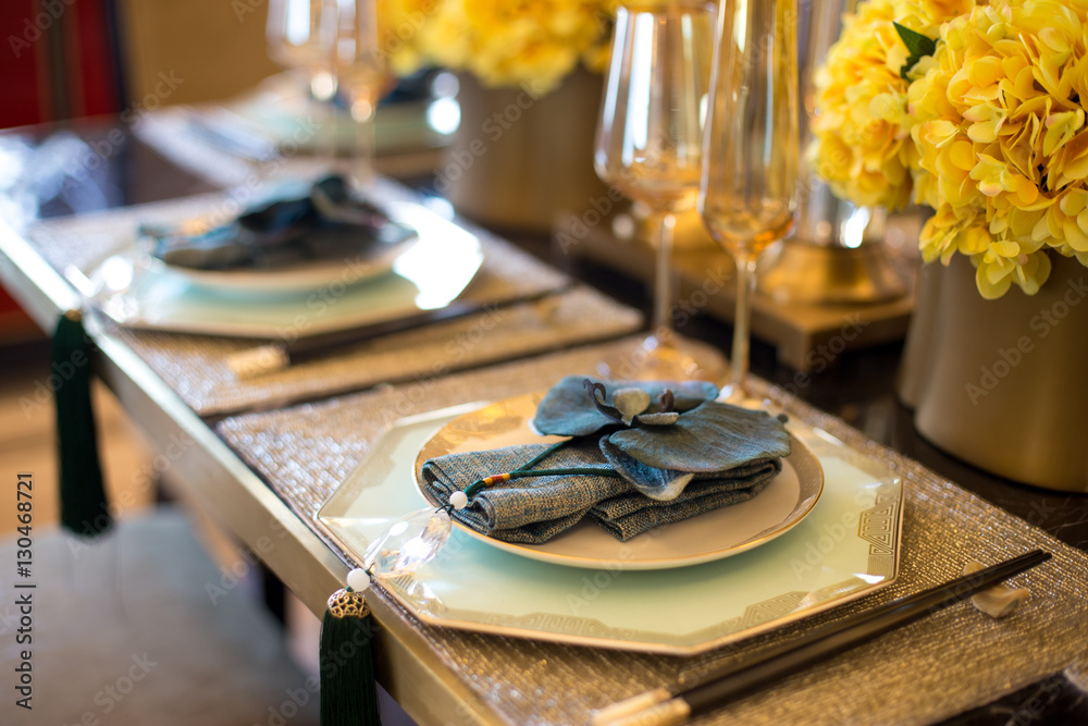 elegant crockery on dining table in modern dining room Stock Photo ...