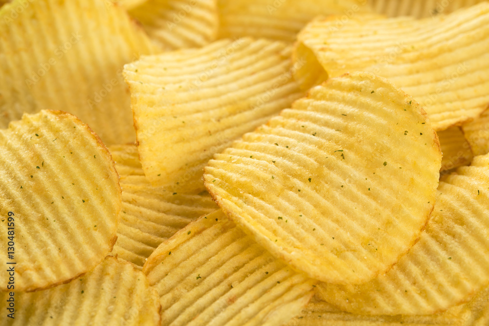 Potato chips close up, food background Stock Photo | Adobe Stock