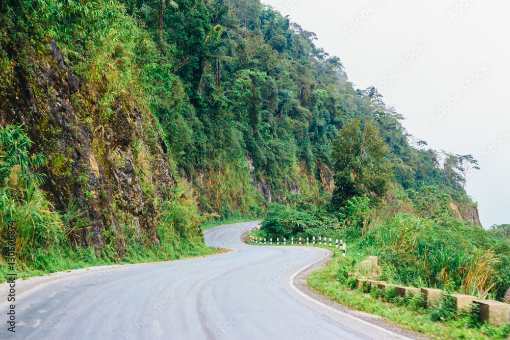 Laos highway - road through Luang Prabang (Luangprabang) Province on a ...