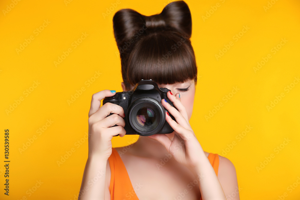 Camera. Beautiful smiling teen girl taking a photo. Pretty model Stock ...