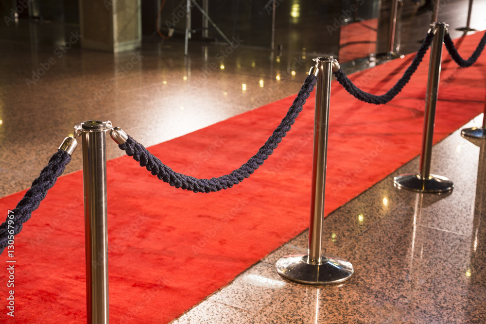 Long red carpet between rope barriers on entrance. Stock Photo | Adobe ...