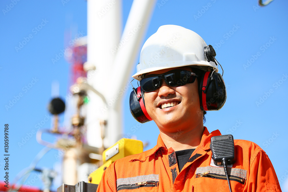 operator recording operation of oil and gas process at oil and rig ...