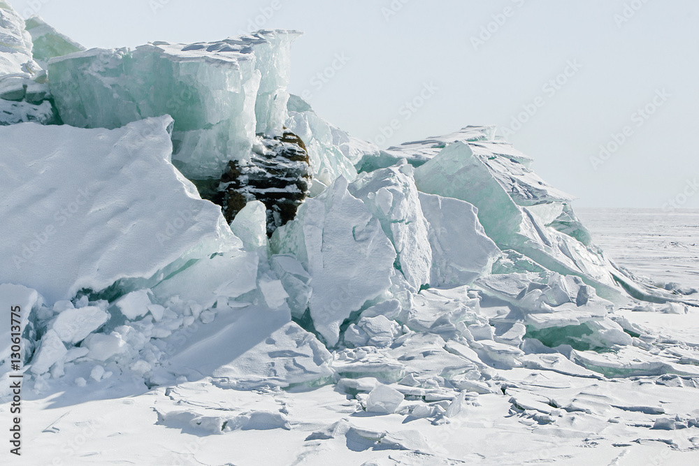 Ice background of huge blocks of aqua ice from fractured floes. Winter ...