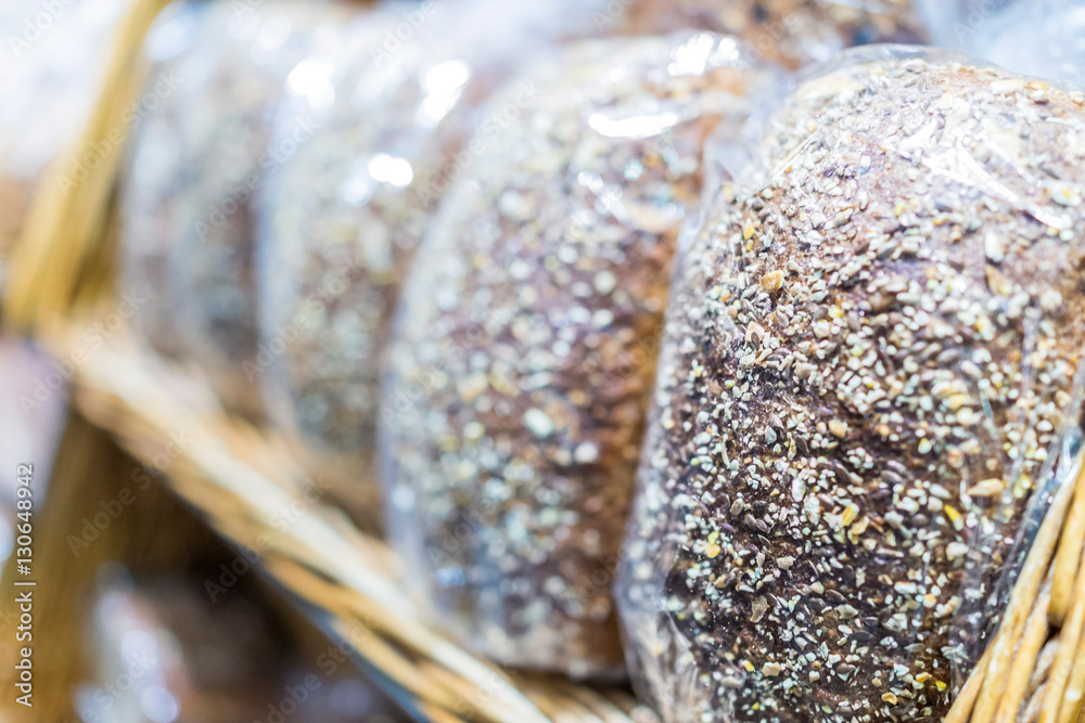 Packaged multi grain bread on display in bakery Stock Photo | Adobe Stock