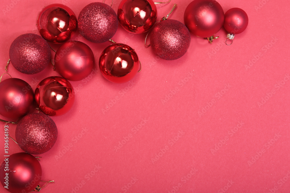 Red christmas balls on a red background Stock Photo | Adobe Stock