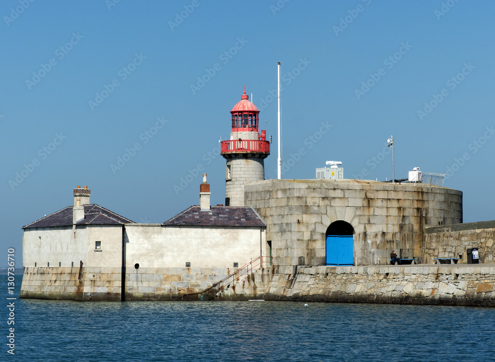 The East Pier Lighthouse and dwelling in Dunlaoghaire harbour in full ...