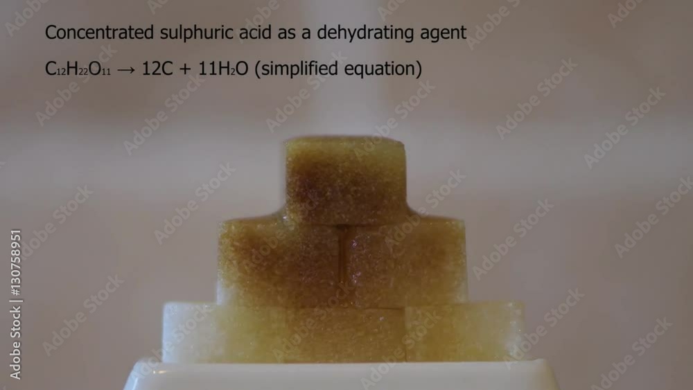 Reaction between sucrose and concentrated sulphuric acid. Sugar turns ...