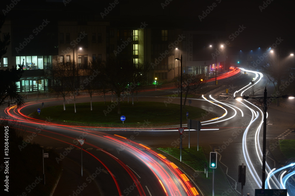 Route Du Fort roundabout, Jersey, U.K. St.Helier junction at night with ...