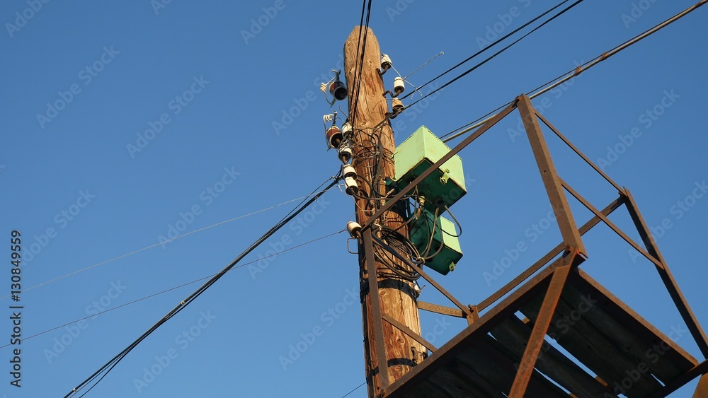 Old electric pole with wires on a background of blue sky Stock Photo ...
