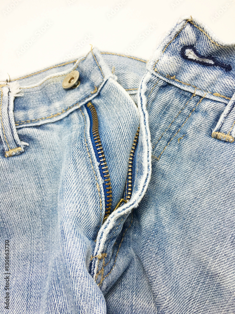 The style and fabric of the jeans style. With buttons and zipper And ...