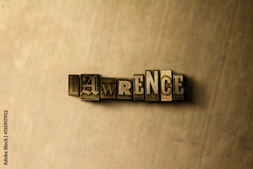 LAWRENCE - close-up of grungy vintage typeset word on metal backdrop ...