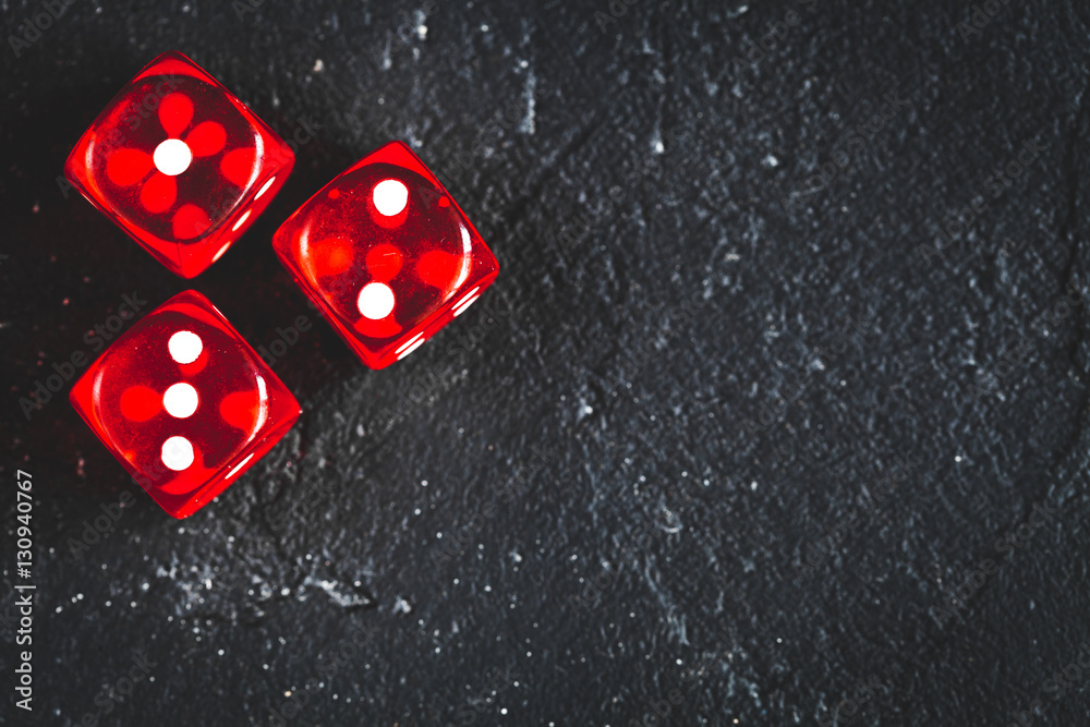 risk concept playing dice at dark background top view Stock-Foto ...