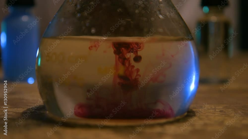 Color drop falling in water creating a Color spread. Stock Video ...