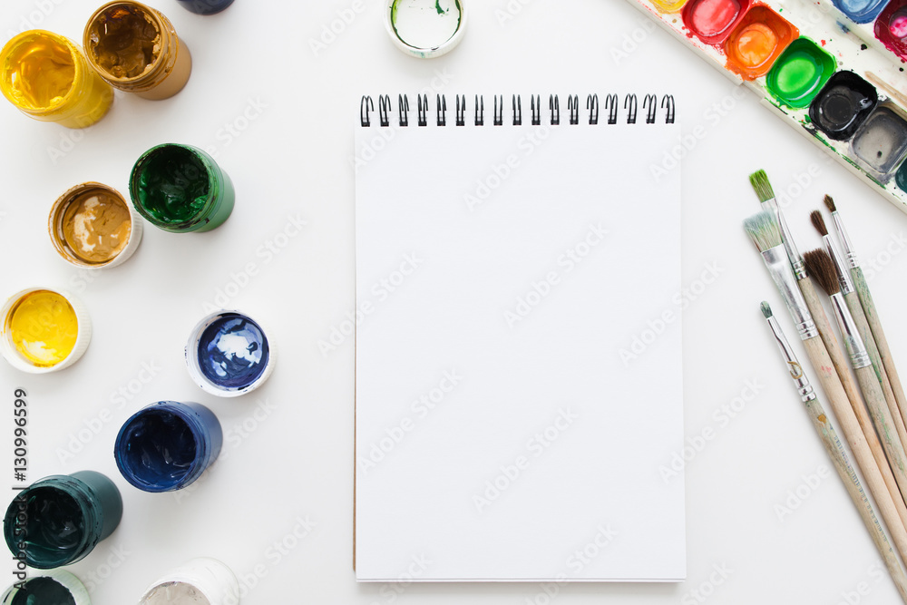 Blank notebook with drawing tools mockup flat lay. Top view on artist ...
