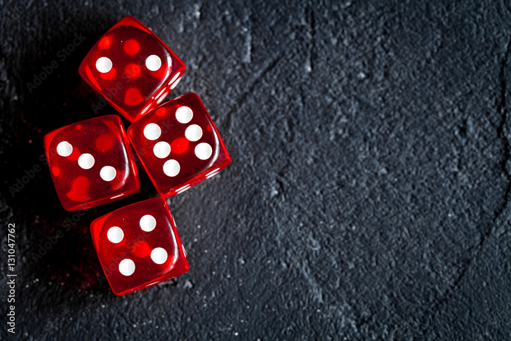 risk concept playing dice at dark background top view Stock-Foto ...