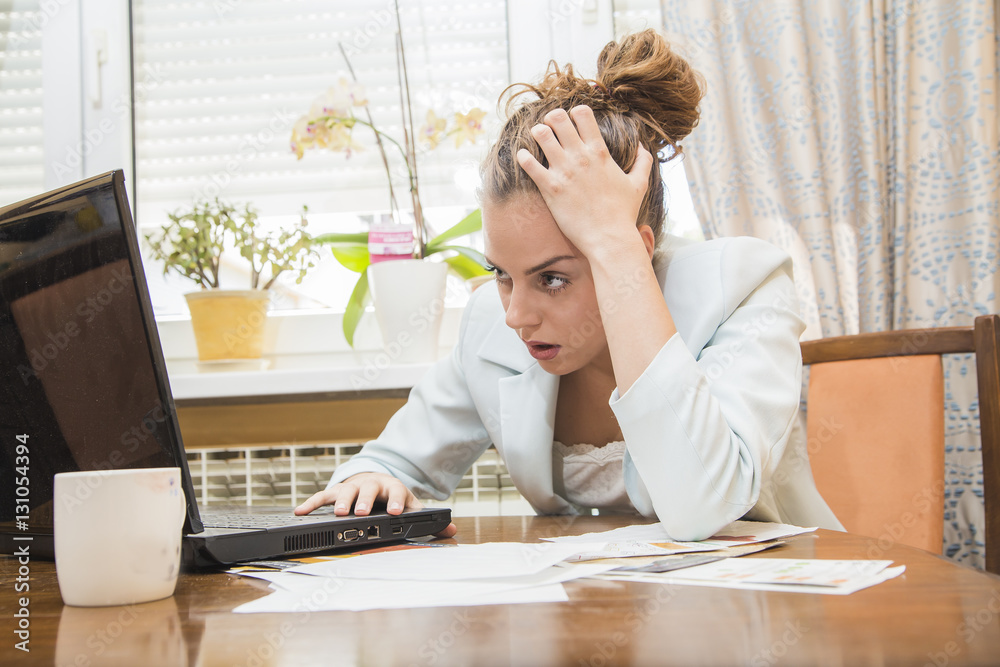 Overworked businesswoman stressed out by the amount of work Stock Photo ...